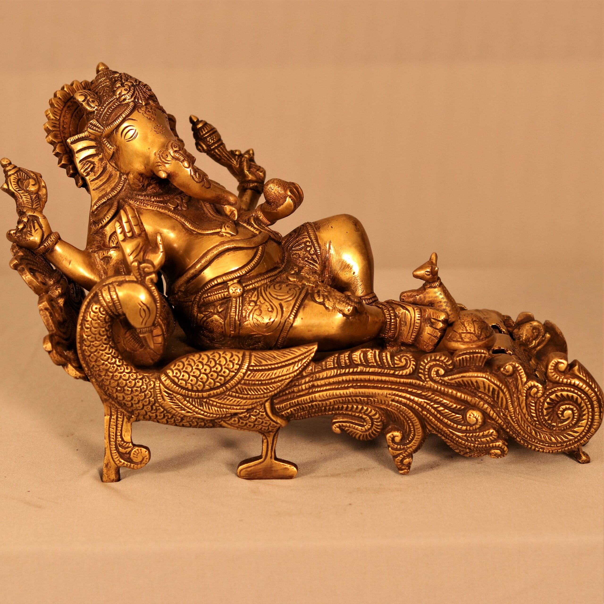RECLINED GANESHA ON MAYUR SINHASANA - Buy exclusive brass statues ...