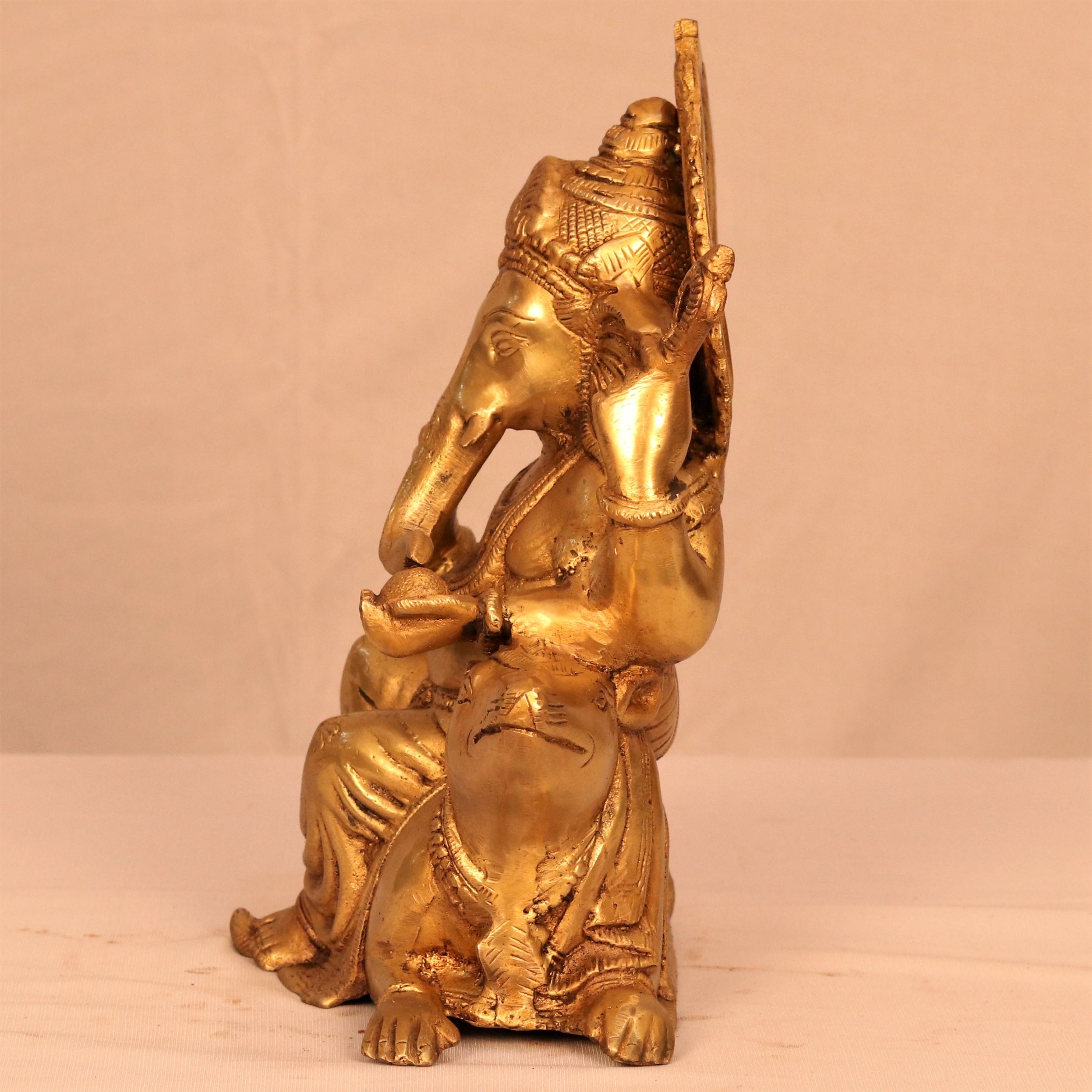 GOLDEN SITTING BRASS GANESHA WITH MUSAK - Gangeswave | Buy exclusive ...
